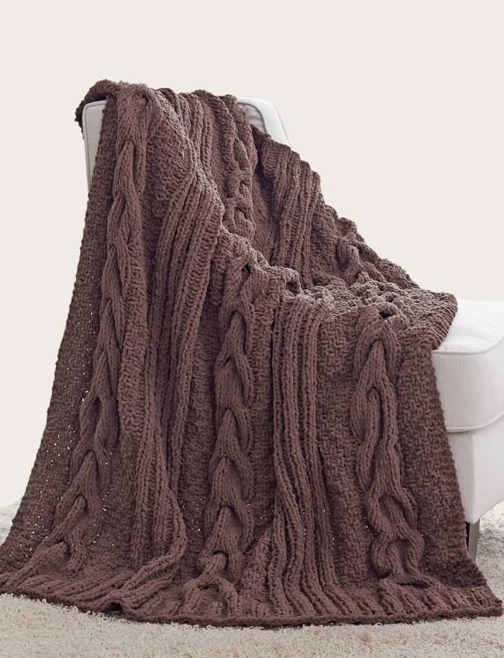Knit Yourself a Cozy with This Free Cable Afghan Pattern!