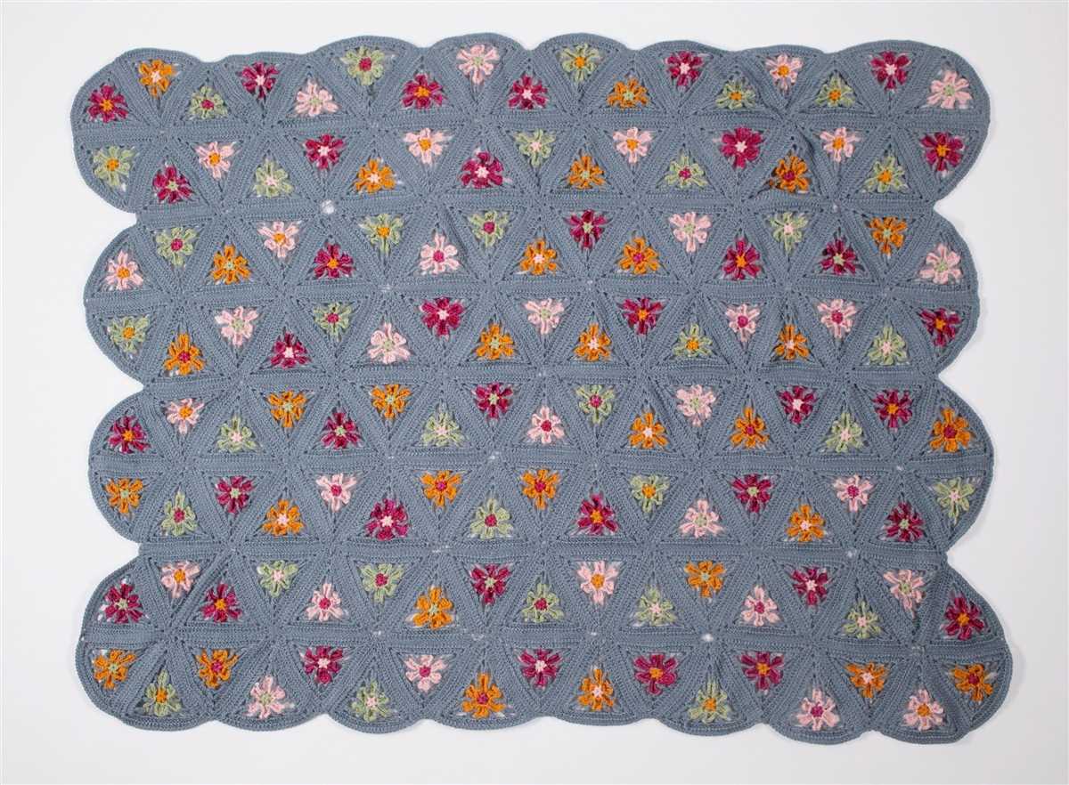 Cozy Corner: A Unique Knitted Triangle Blanket Pattern
