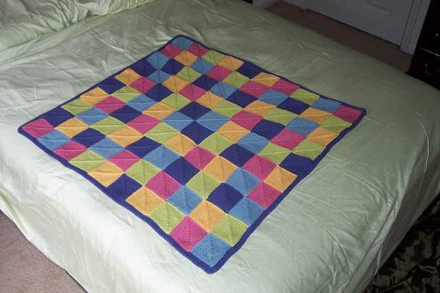 Stitching Together a Cozy Blanket with Knitted Squares